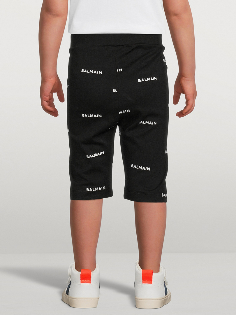 BALMAIN Kids Cotton Bike Shorts In Logo Print | Holt Renfrew