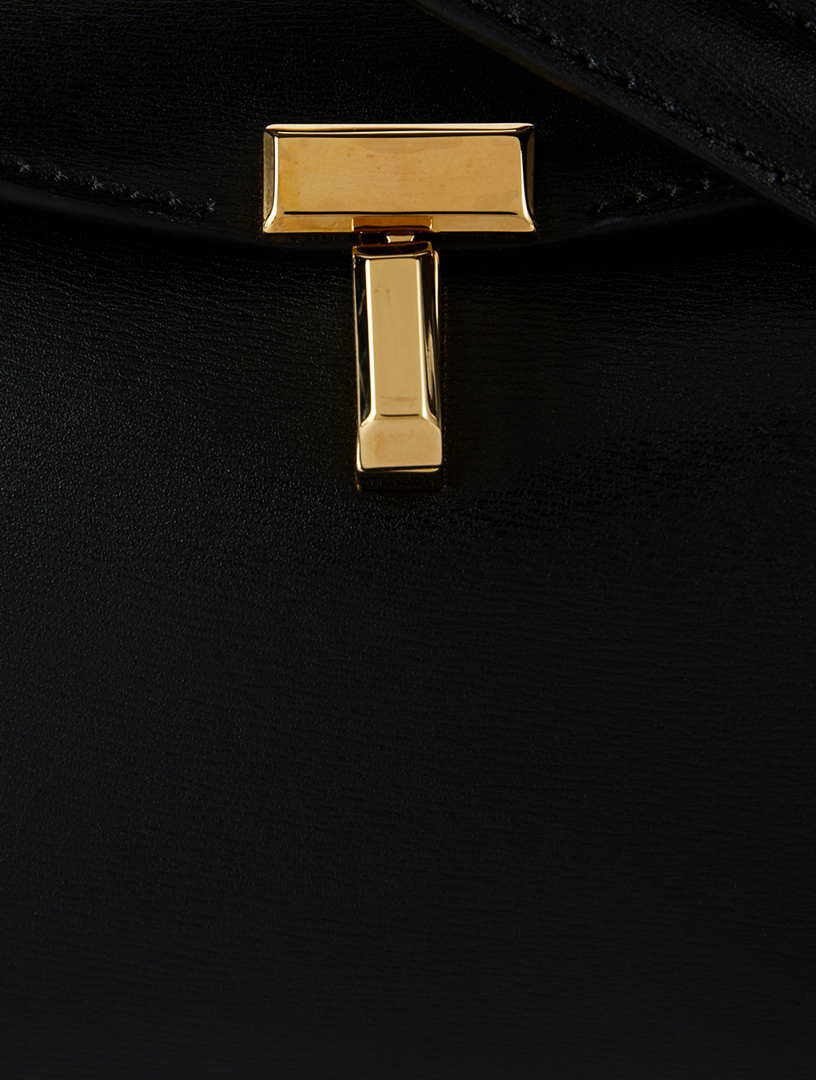 TOTÊME T-Lock Leather Clutch | Holt Renfrew